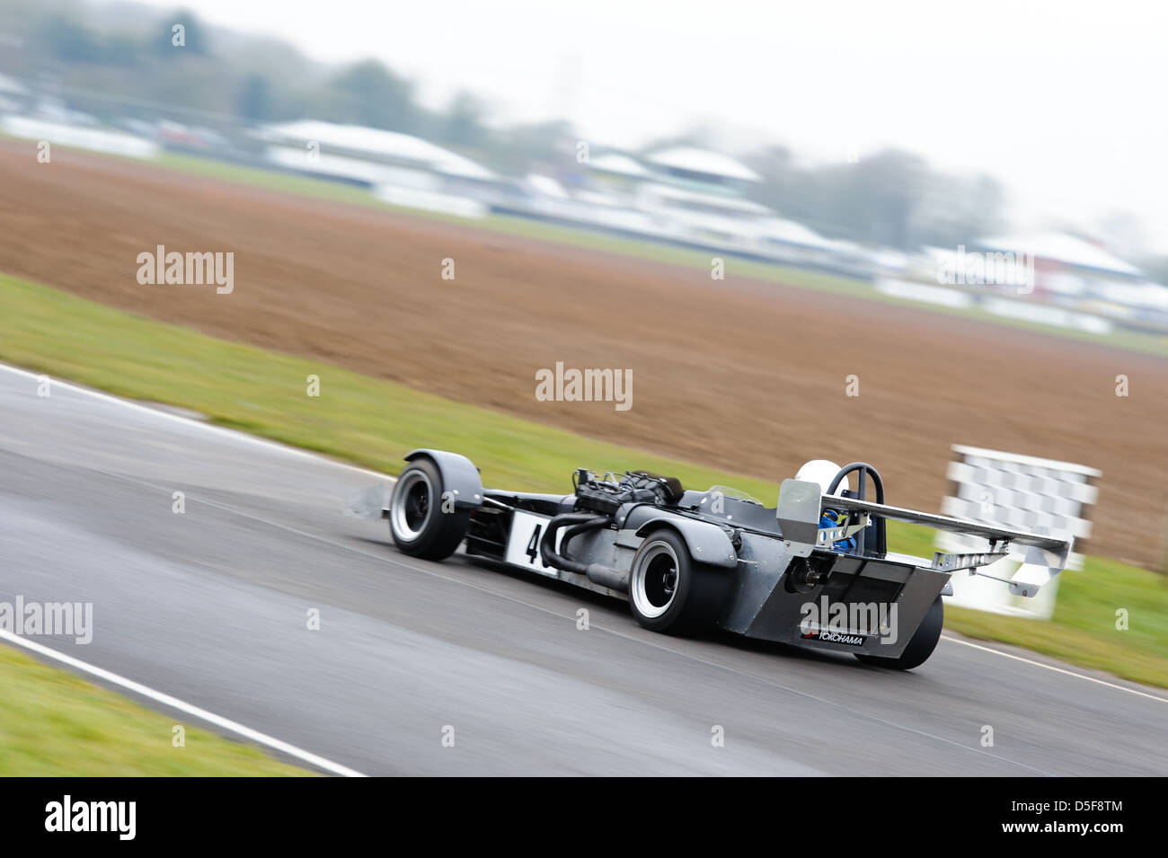 A car racing around Castle Combe Circuit at the Bristol Motor Club's ...