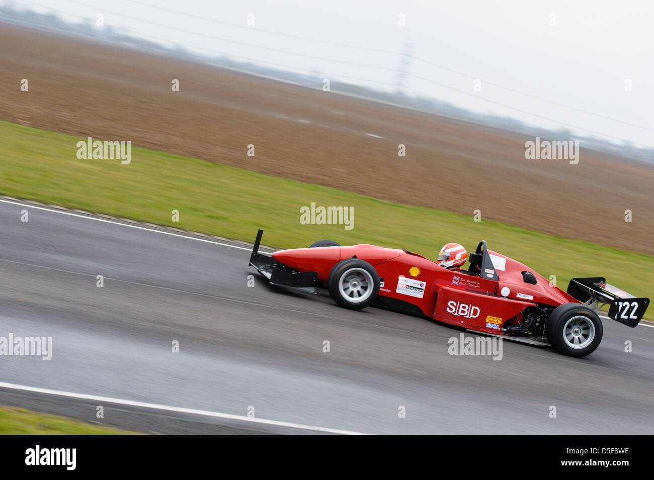 A car racing around Castle Combe Circuit at the Bristol Motor Club's ...