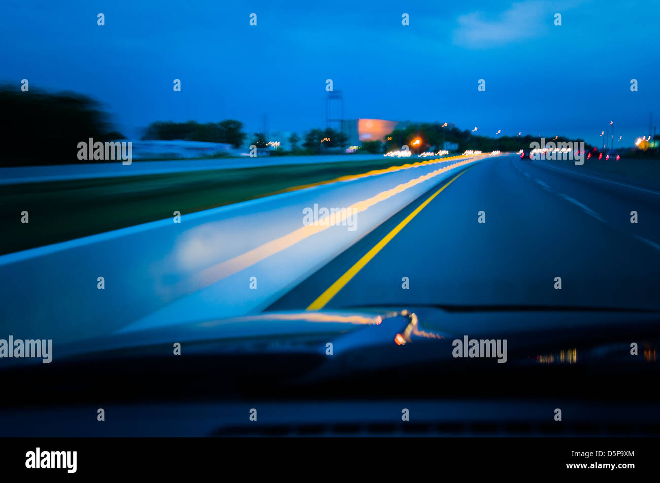 Blurred motion interstate lines of an SUV driving on interstate 40 ...