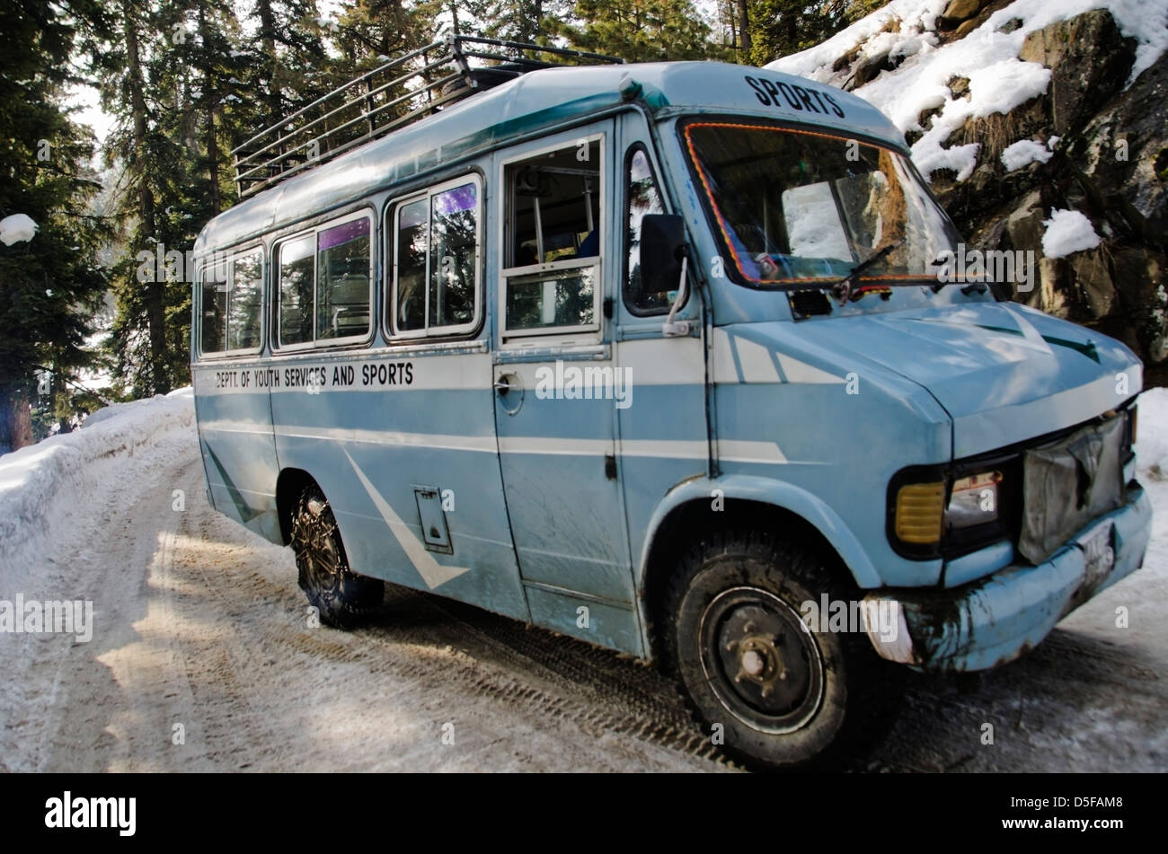Minibus on snowy mountain road, Gulmarg, Jammu And Kashmir, India Stock ...