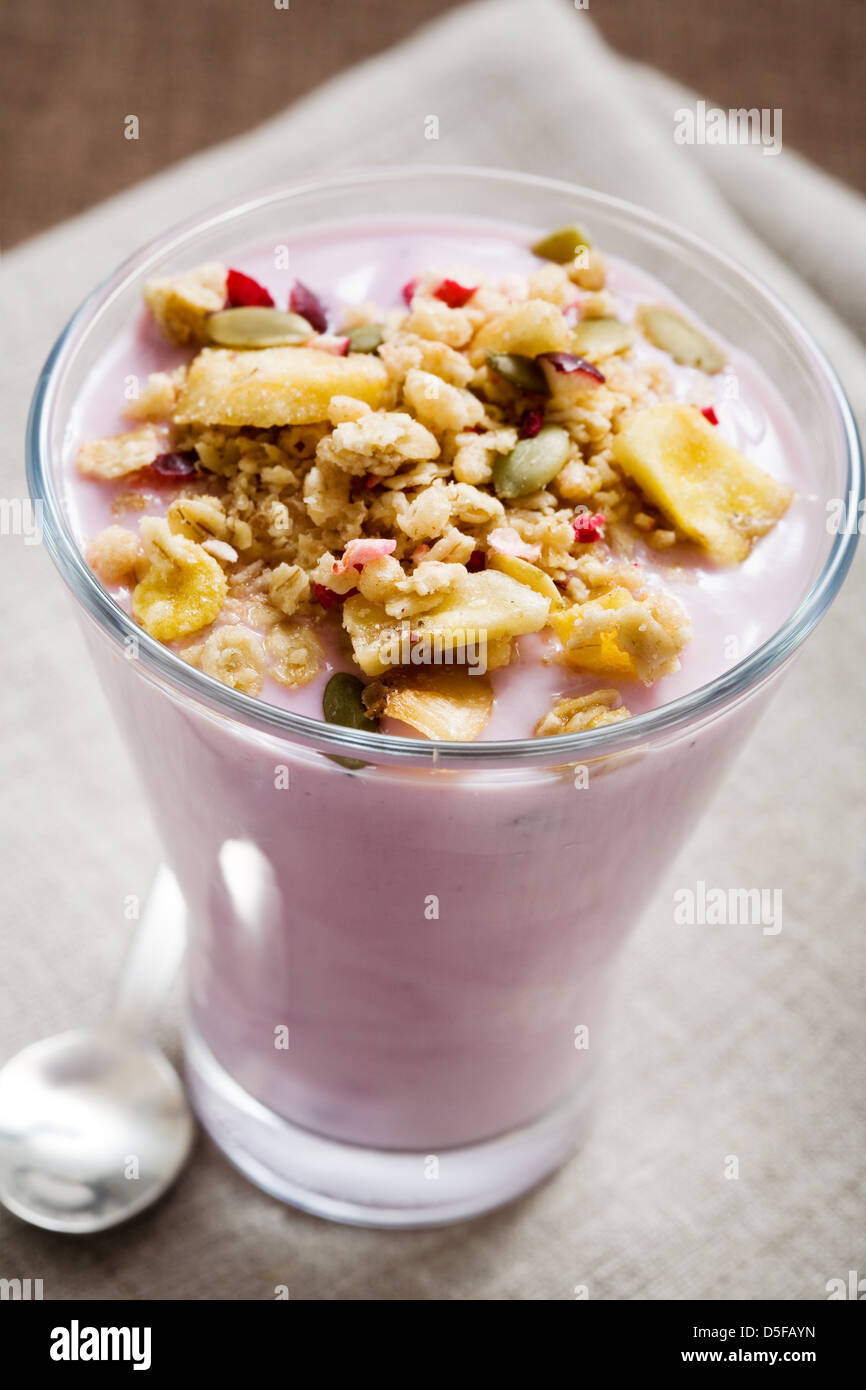 Blueberry yogurt and muesli with dried fruit Stock Photo - Alamy