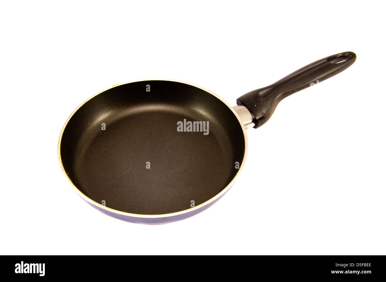 a black metal pan isolated on white background Stock Photo - Alamy