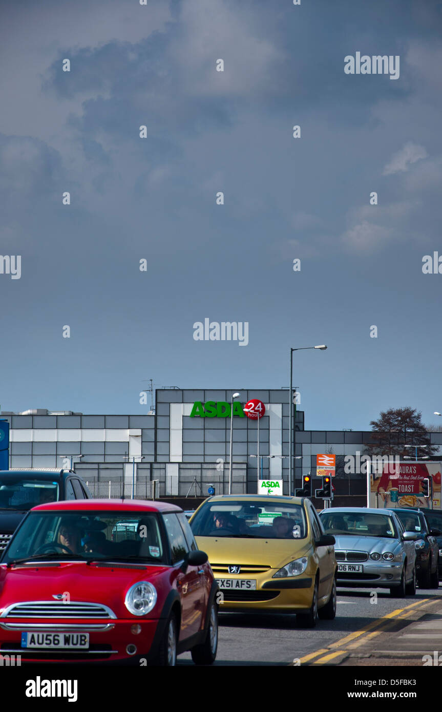Traffic cars in front of Asda supermarket Stock Photo - Alamy