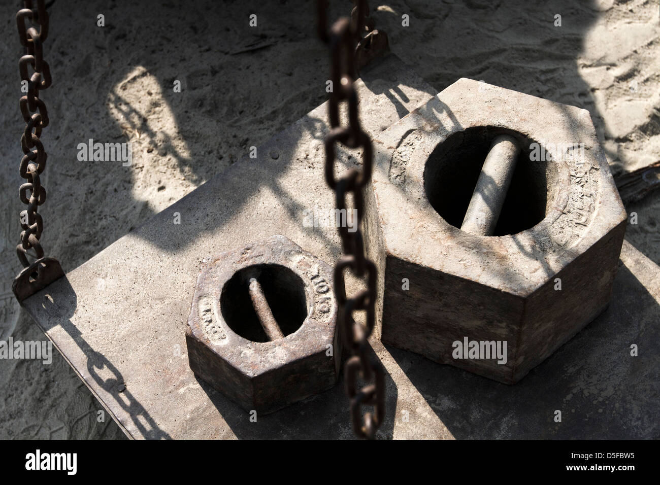 Close-up of an old fashioned weighing scale during Kumbh Mela ...