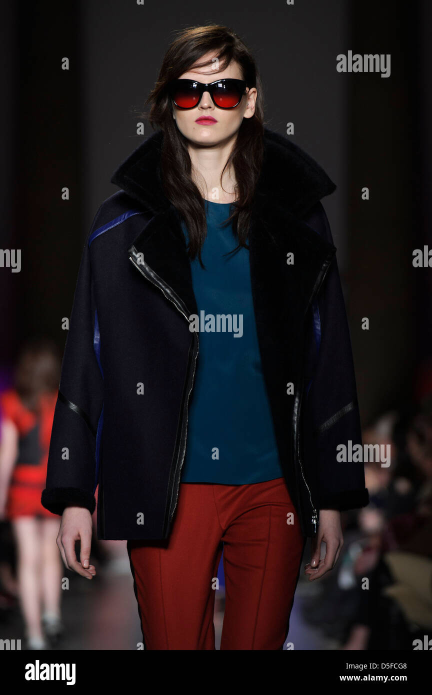 A model wears a design from the Paul Smith collection during London ...