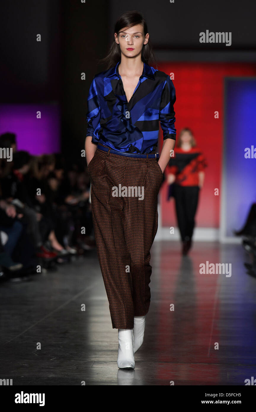 A model wears a design from the Paul Smith collection during London ...