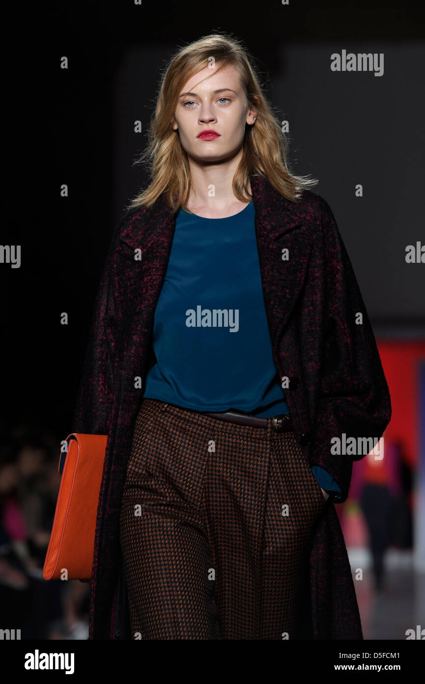 A model wears a design from the Paul Smith collection during London ...