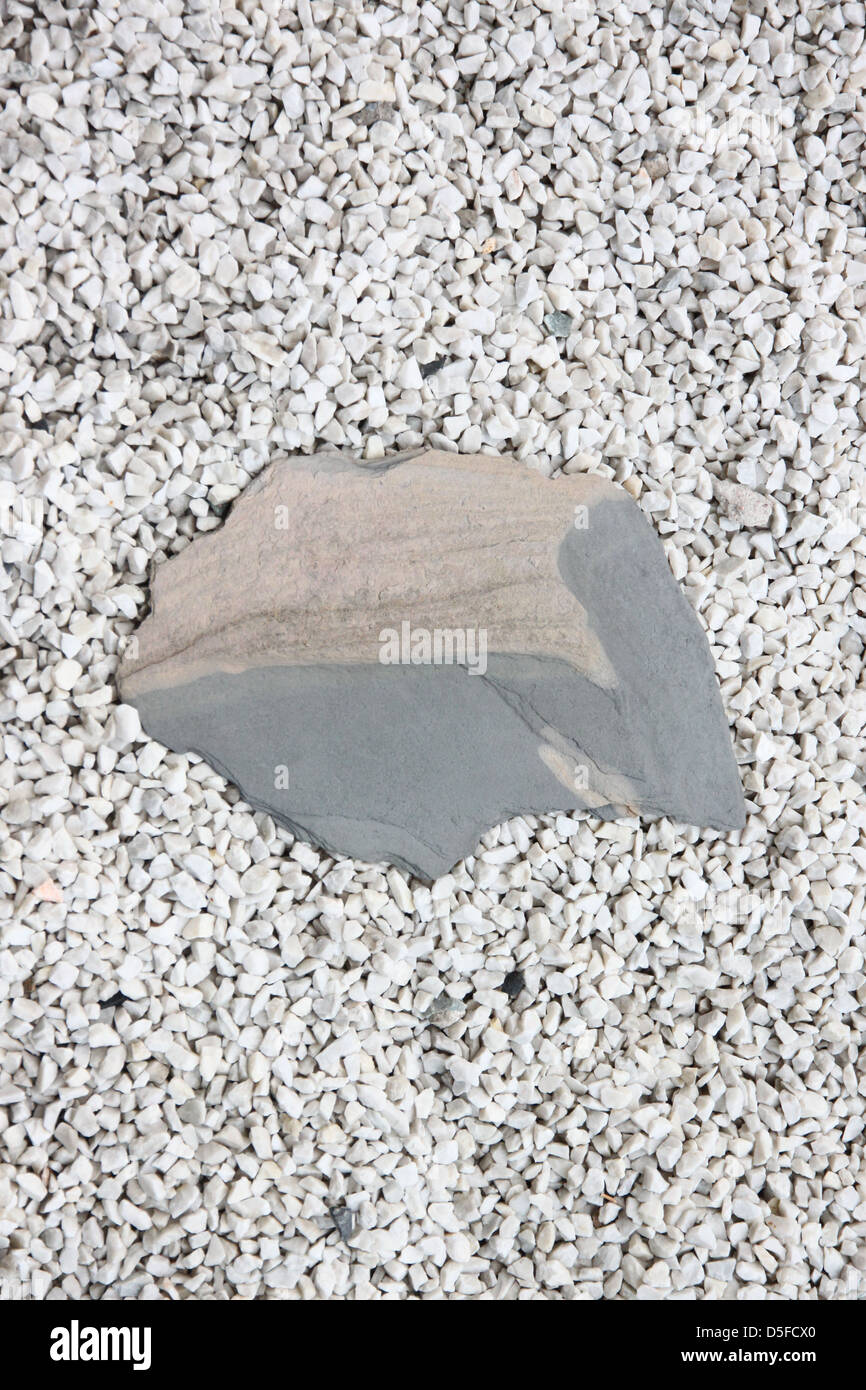 The Large stone slabs on a white small rock Stock Photo - Alamy