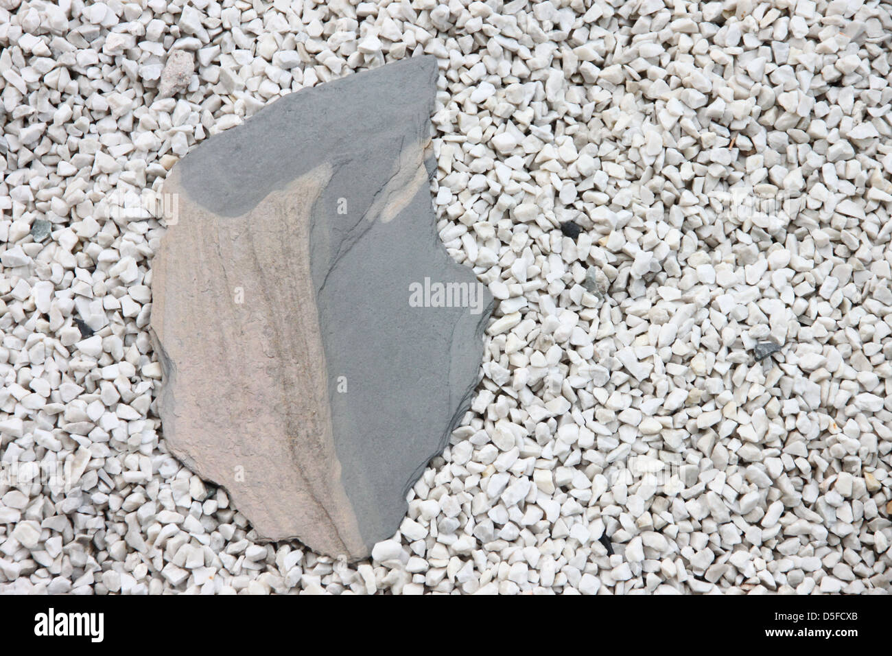 The Large stone slabs on a white small rock Stock Photo - Alamy