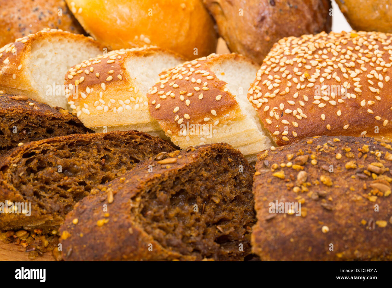 bread and buns on wooden plate Stock Photo - Alamy