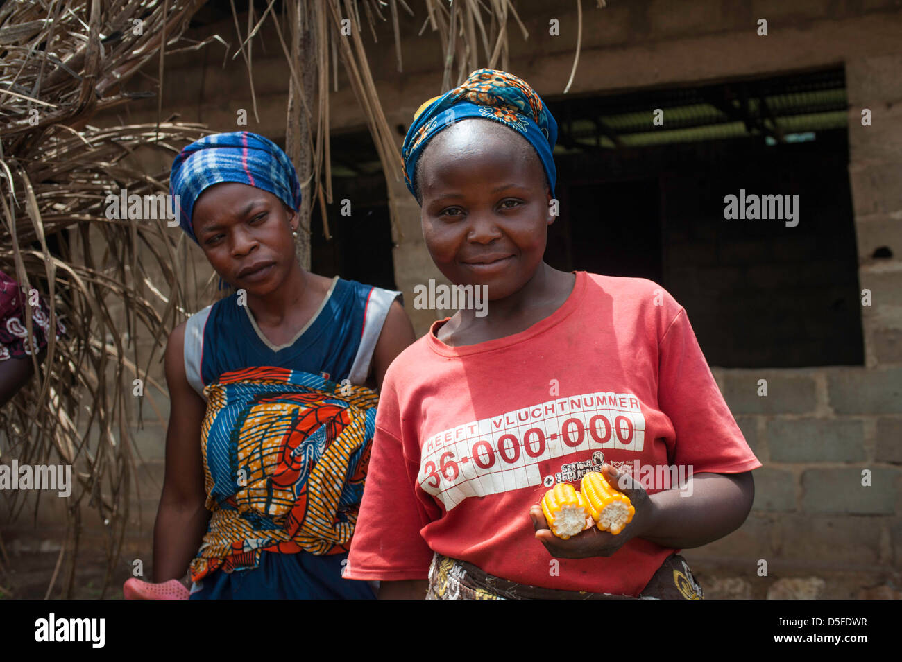 Woman with corn on the cob hi-res stock photography and images - Alamy