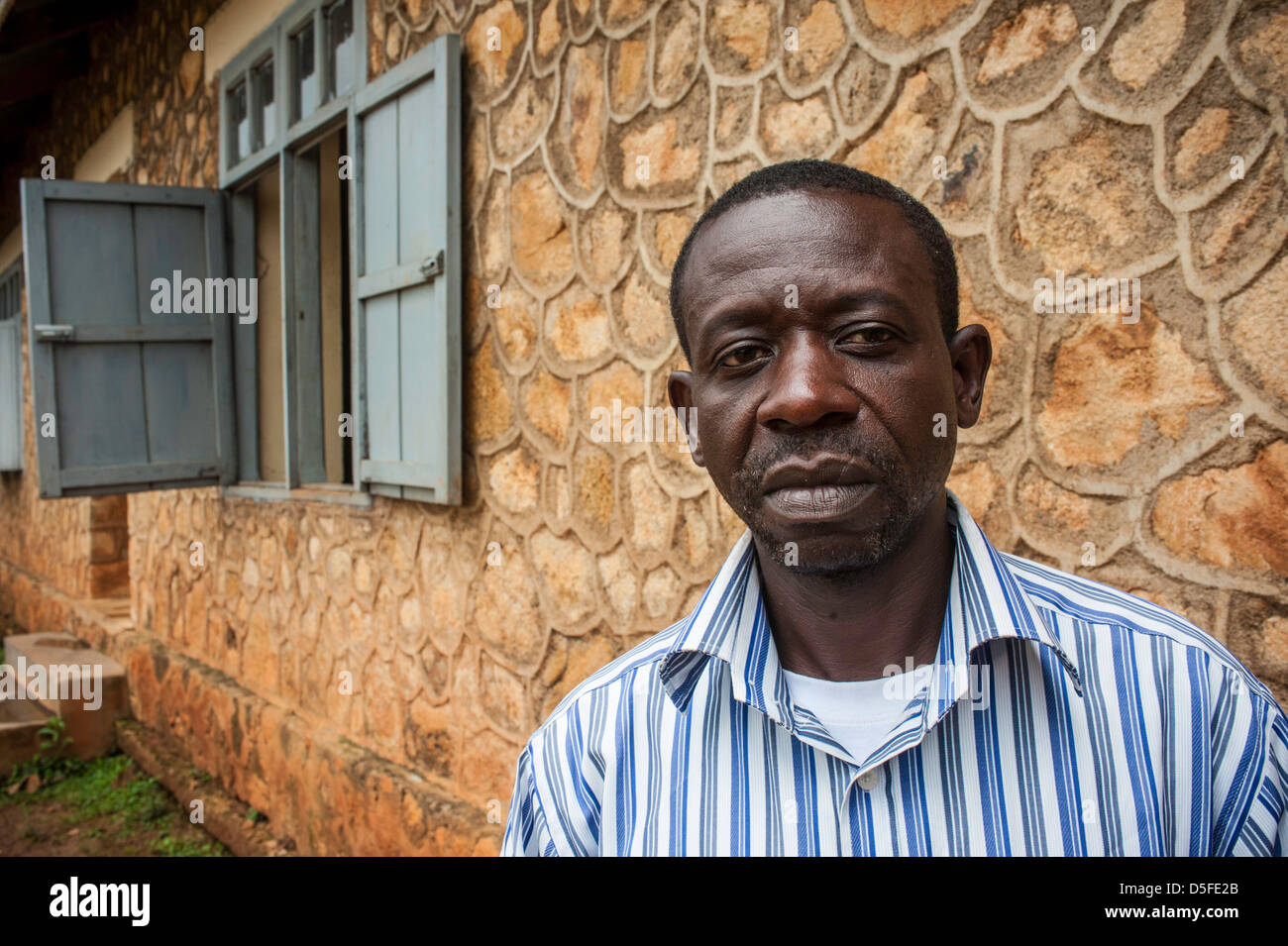 Sad african man in Cameroon Stock Photo - Alamy