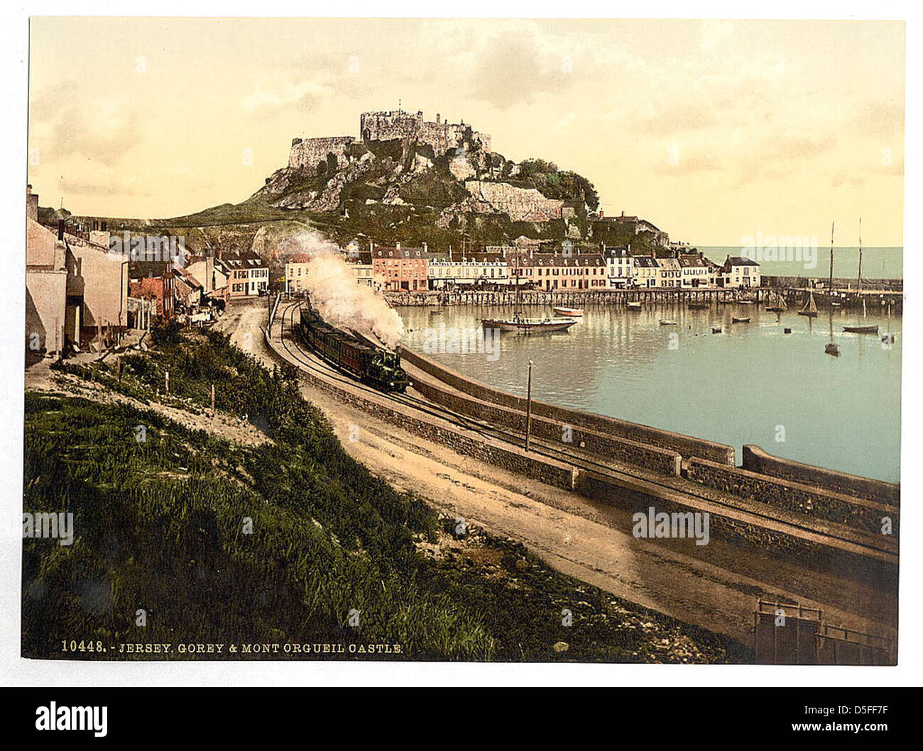 A scenic photograph of Gorey and its castle on Jersey in the Channel ...