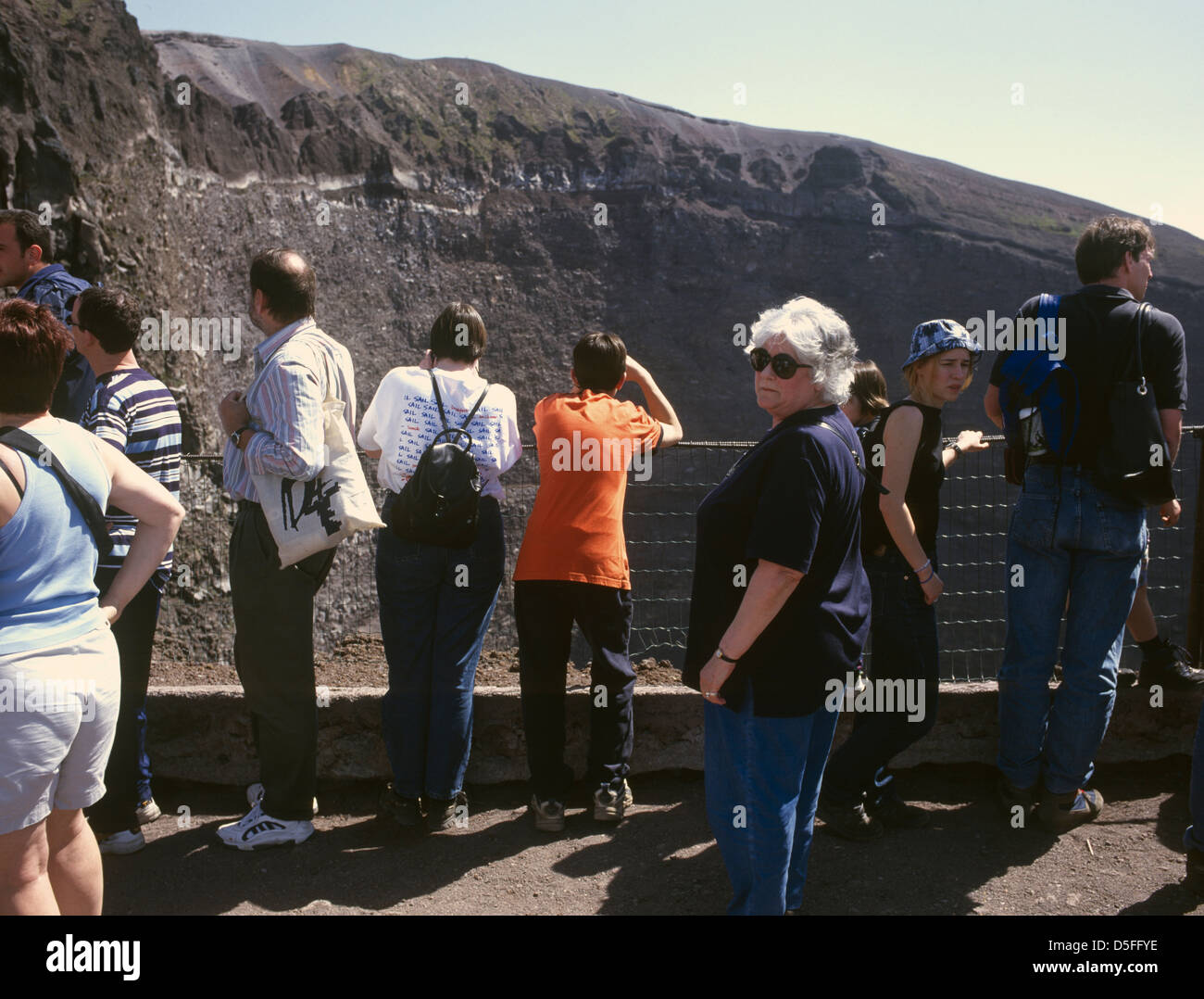 Italy Campania Mount Vesuvius Tourists peering into the crater Stock ...