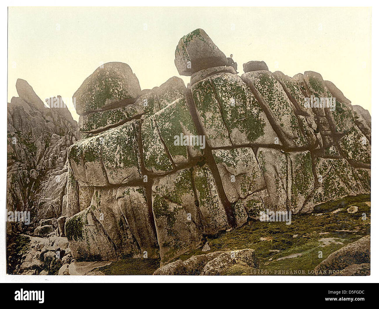 A photograph of Logan Rock in Penzance, Cornwall, England, showcasing ...
