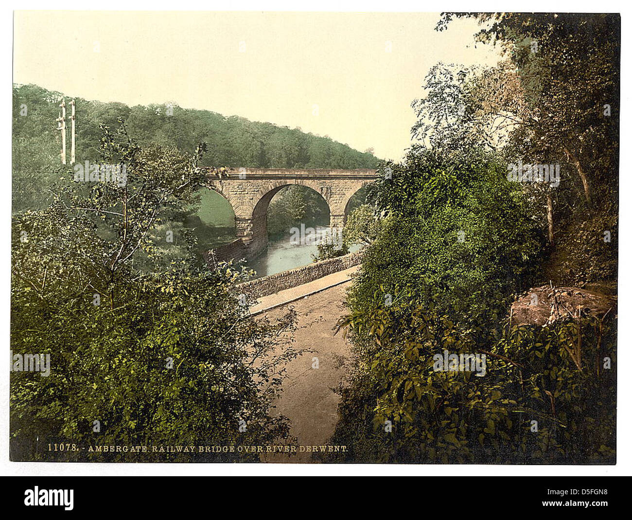 The Ambergate railway bridge spans the River Derwent in Derbyshire ...