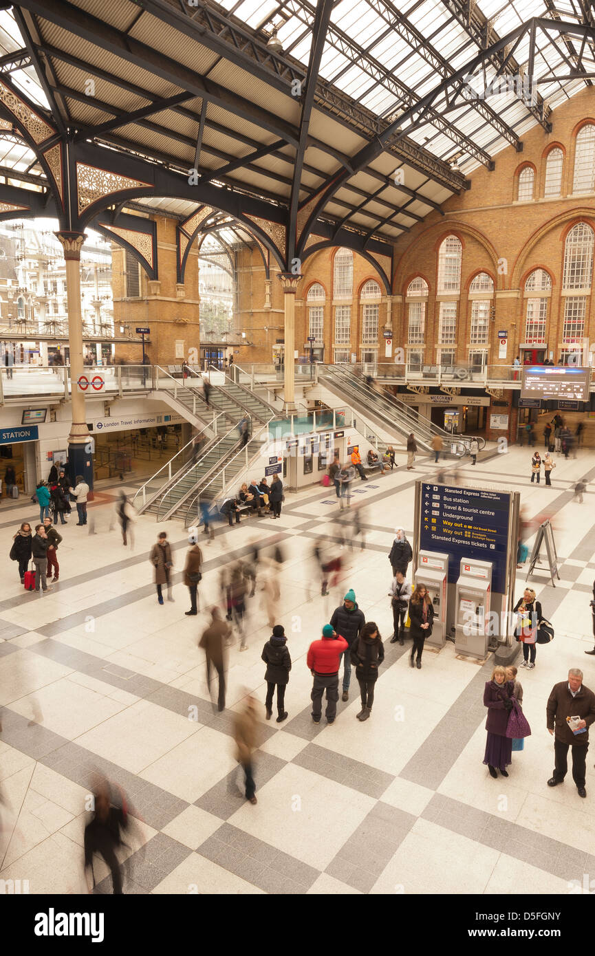Commuters at Liverpool street station during morning rush hour over a ...
