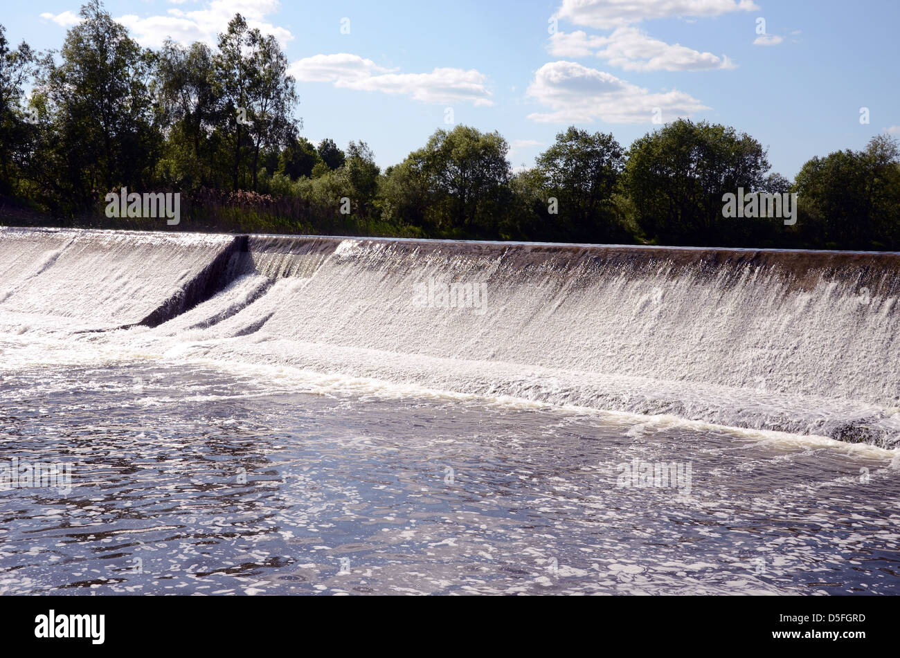 dam construction on river and summer waterfall Stock Photo - Alamy