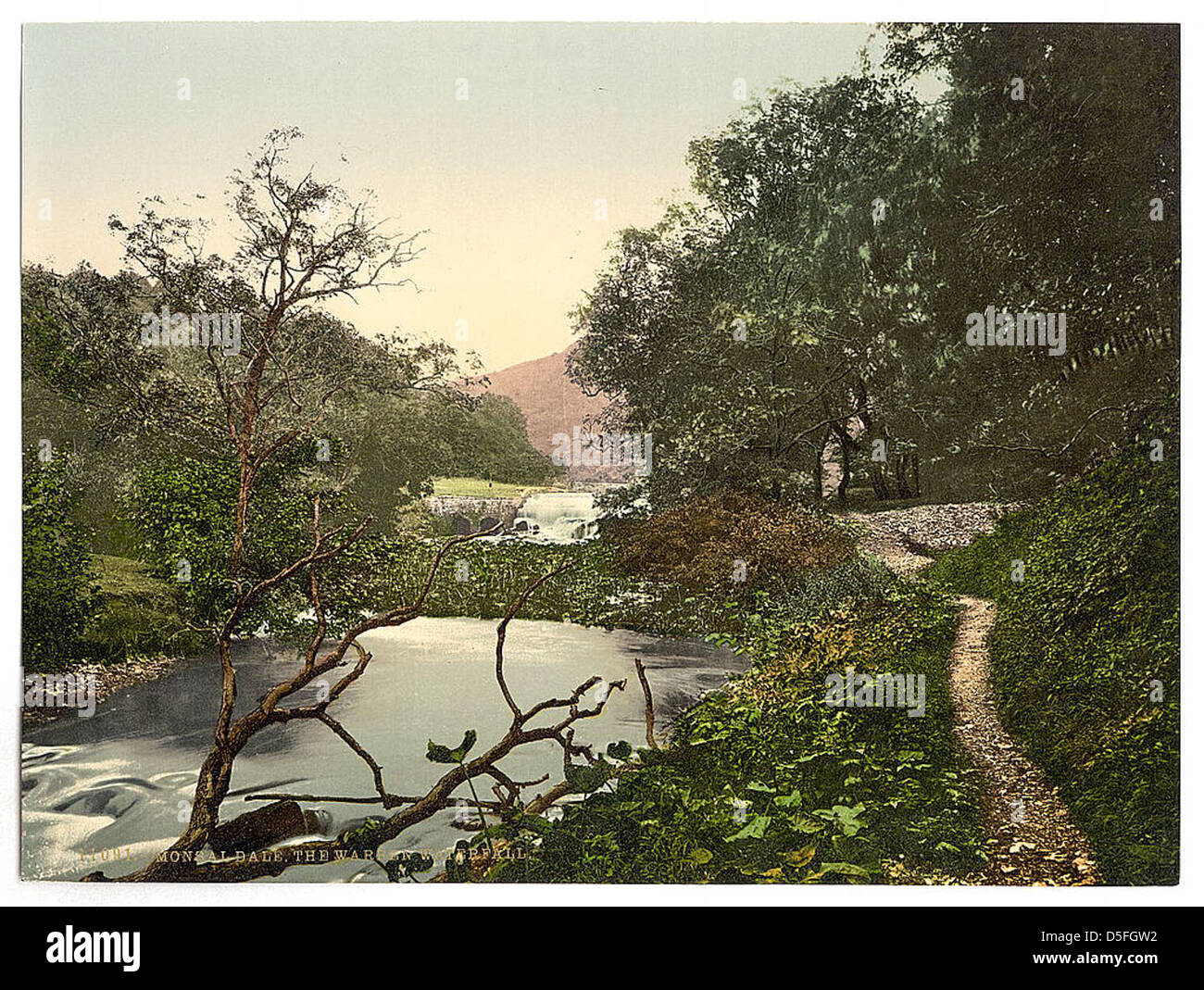 The Warren Waterfall at Monsal Dale in Derbyshire, England, is captured ...
