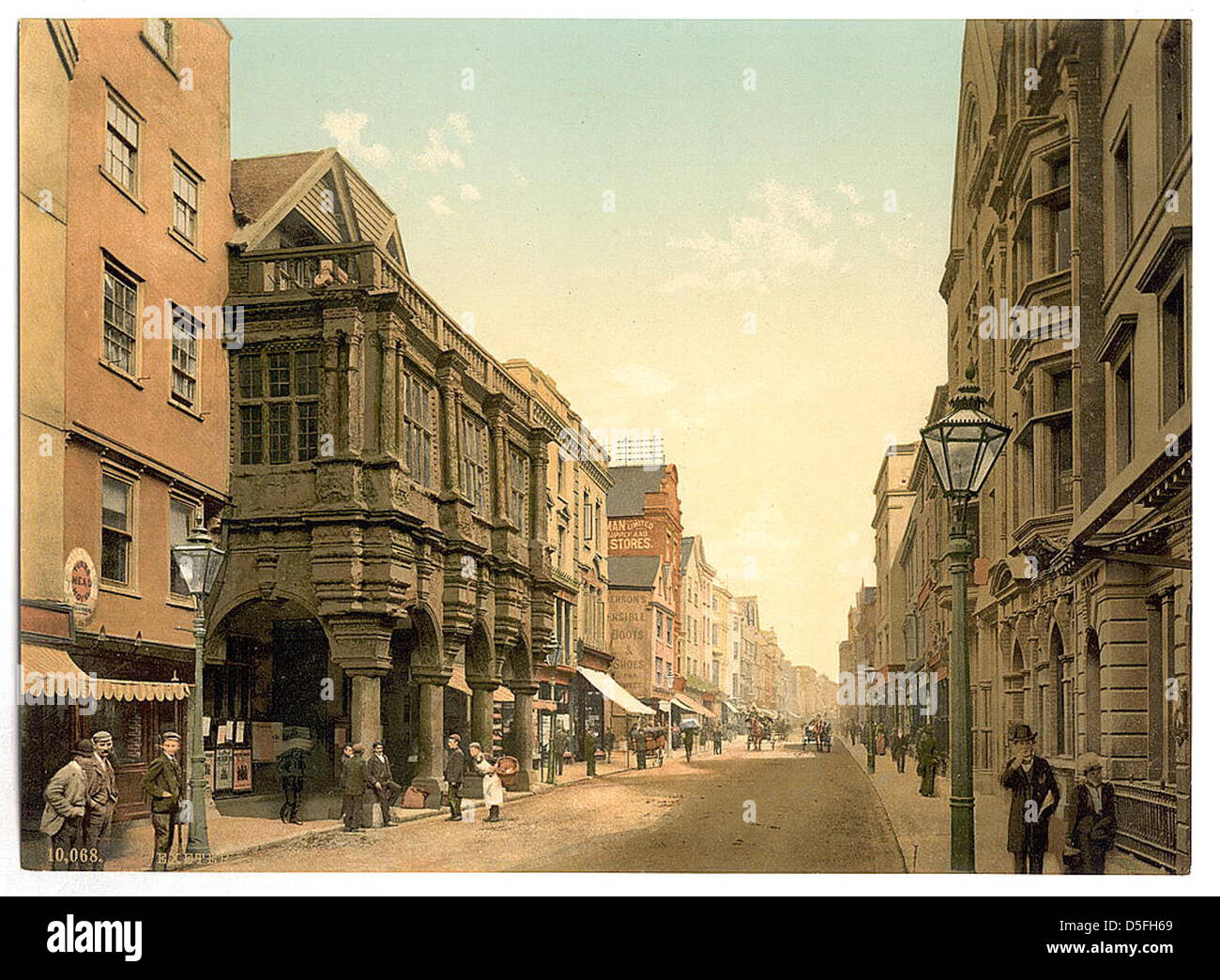 A historic photograph of High Street in Exeter, England, capturing the ...