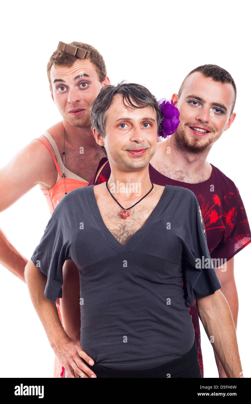 Portrait of three smiling transvestites cross-dressing, isolated on ...
