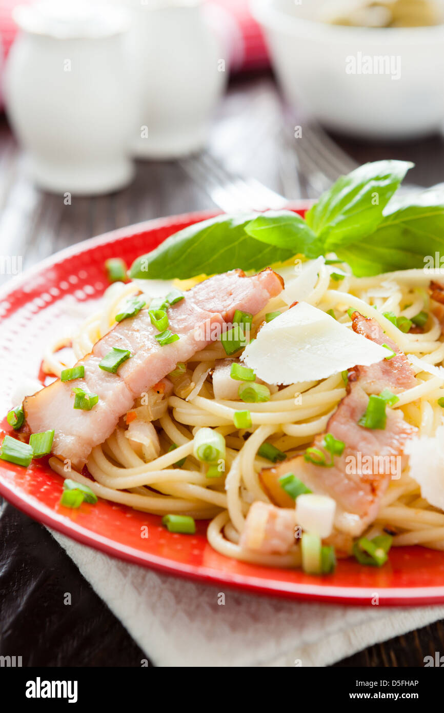 spaghetti with fried ham and cheese, pasta Stock Photo - Alamy