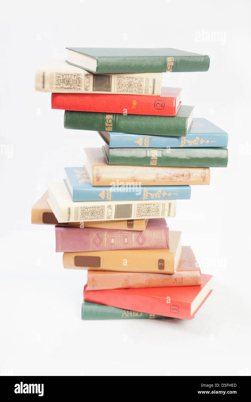 Book heap isolated on white Stock Photo - Alamy