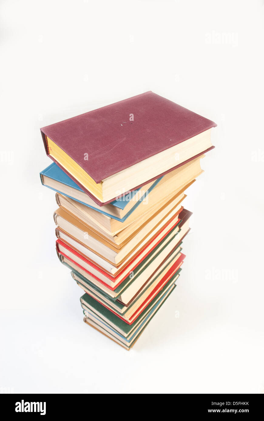 Book heap isolated on white Stock Photo - Alamy