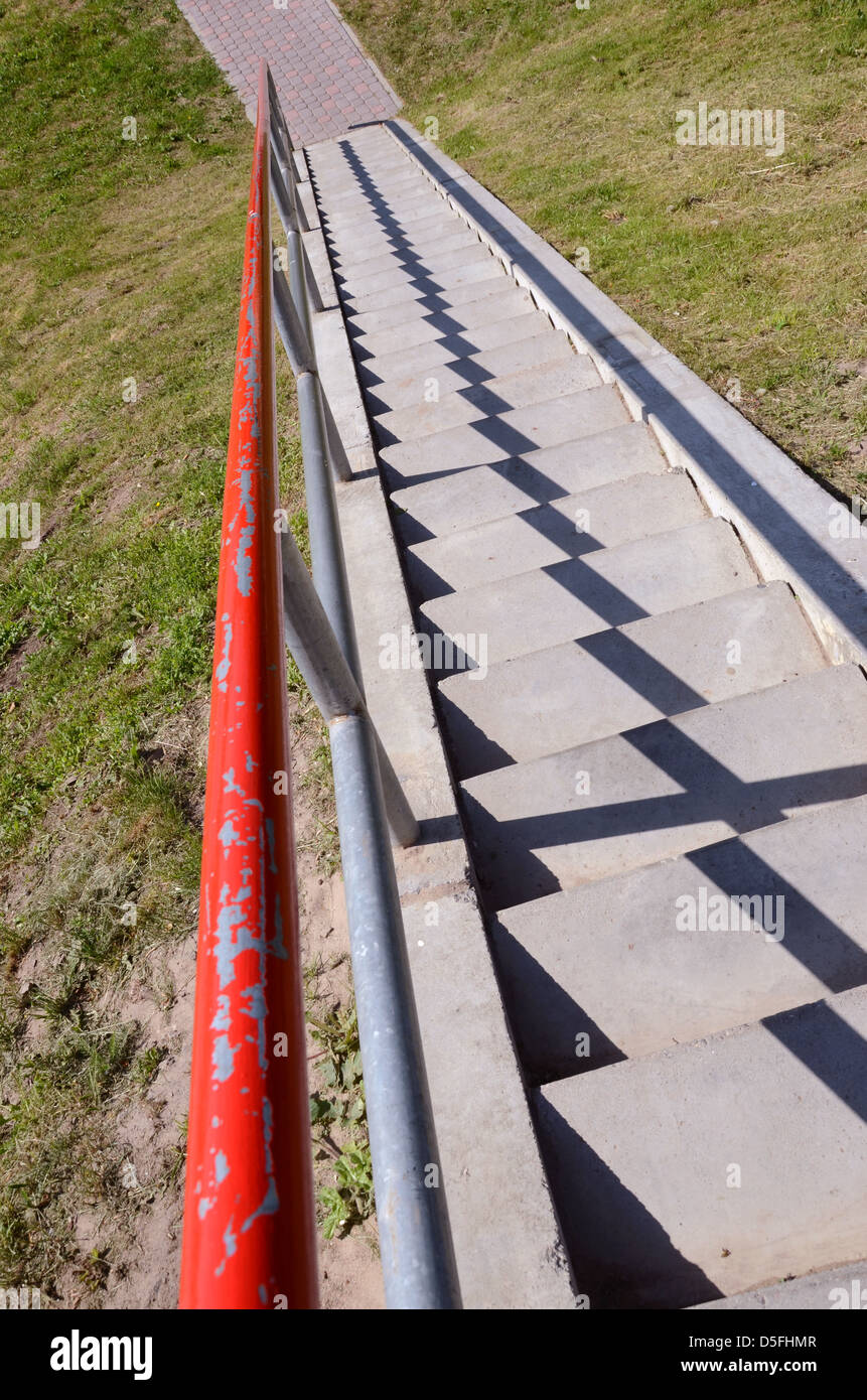 staircase construction with red metal rail Stock Photo - Alamy