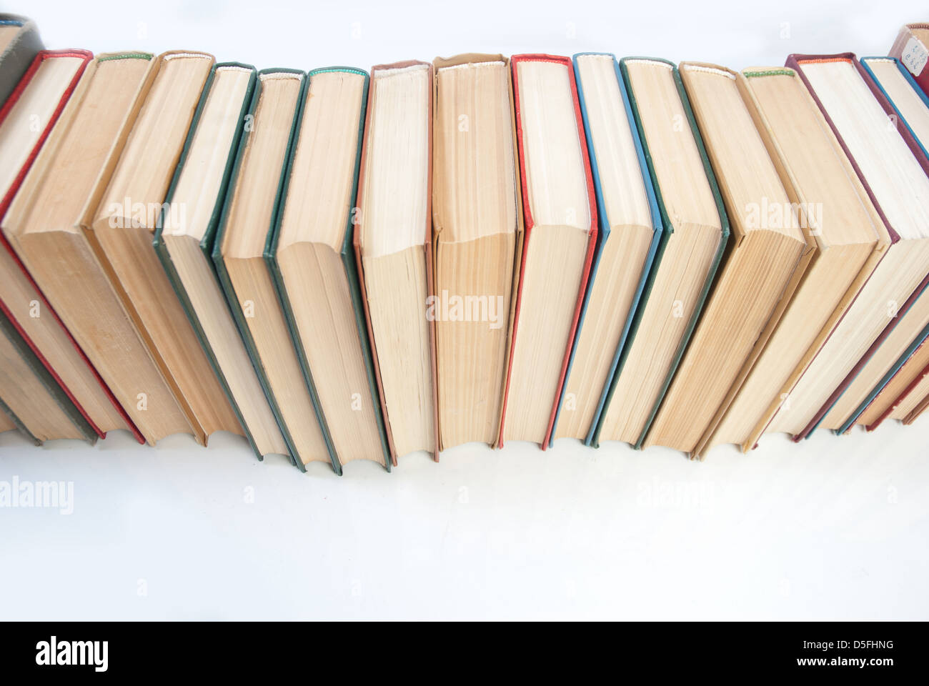 Books heap hi-res stock photography and images - Alamy