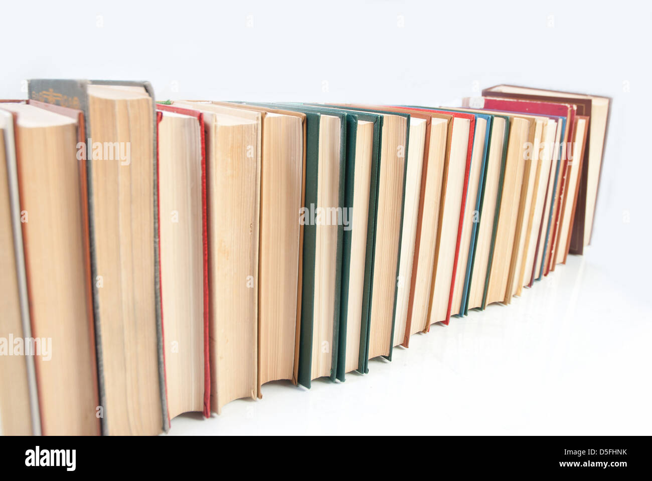 A row of books Stock Photo - Alamy