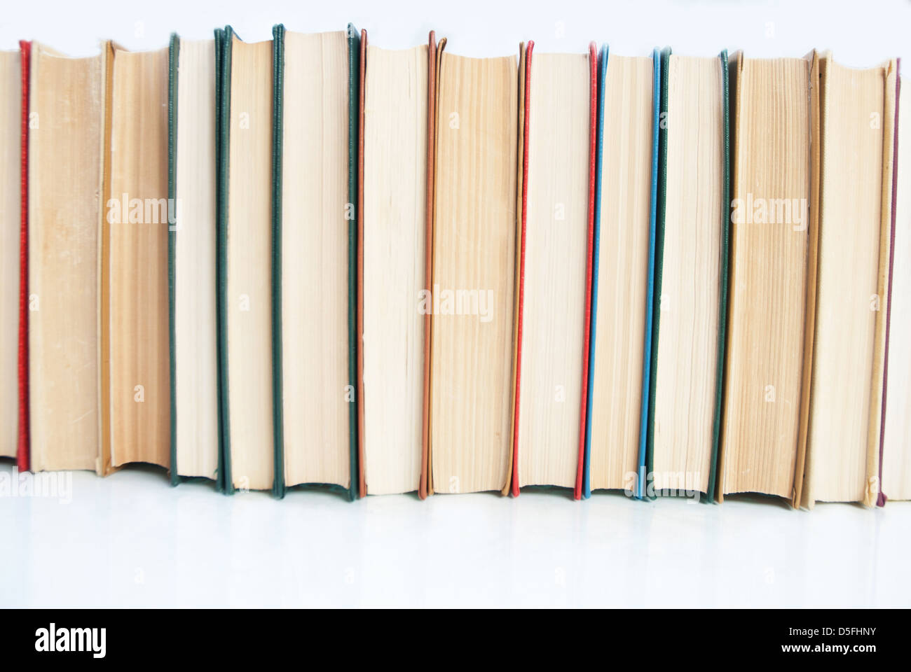 Books heap hi-res stock photography and images - Alamy