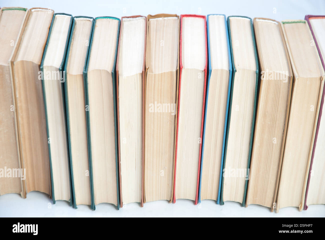A row of books Stock Photo - Alamy