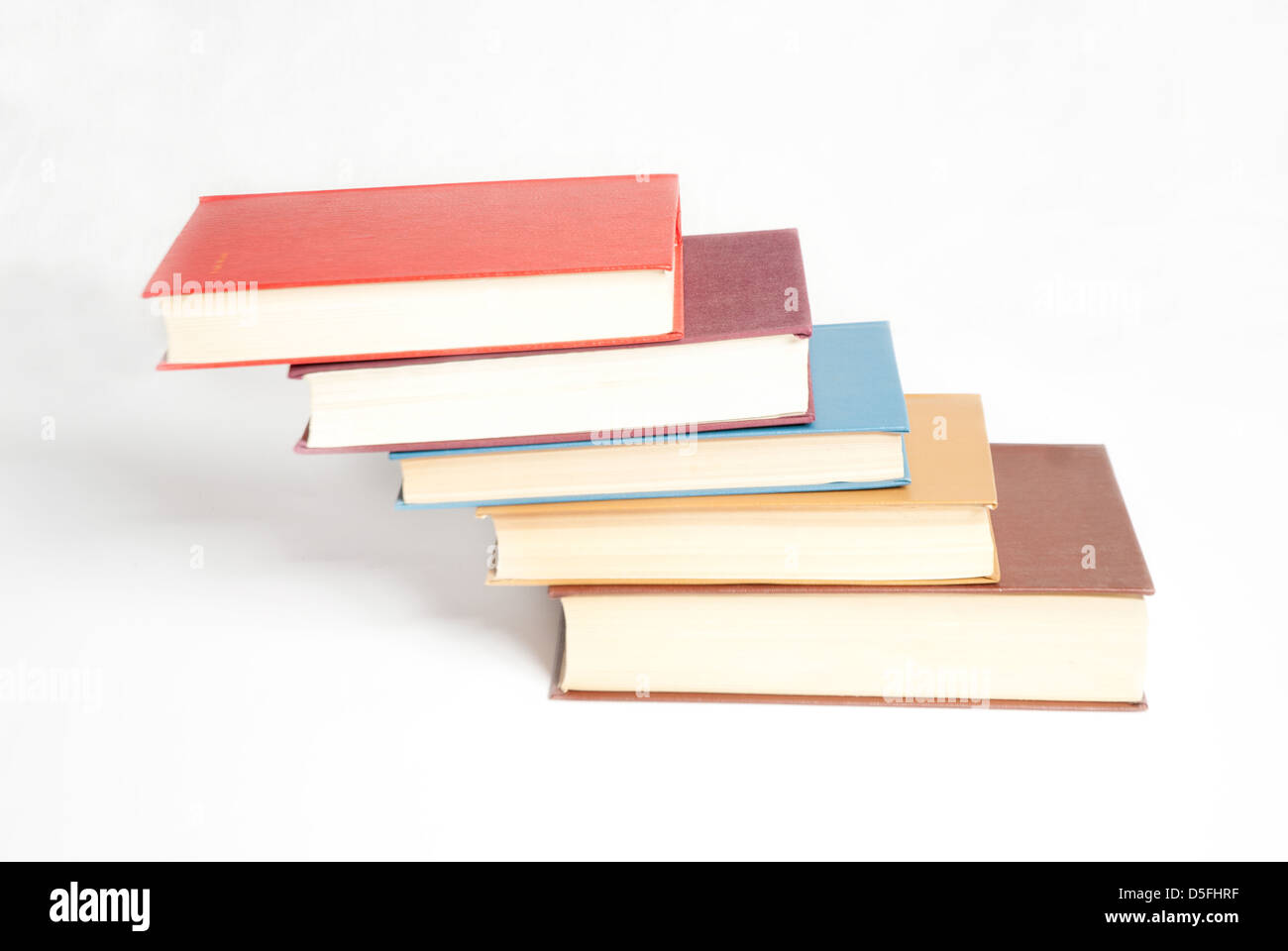 Book heap isolated on white Stock Photo - Alamy