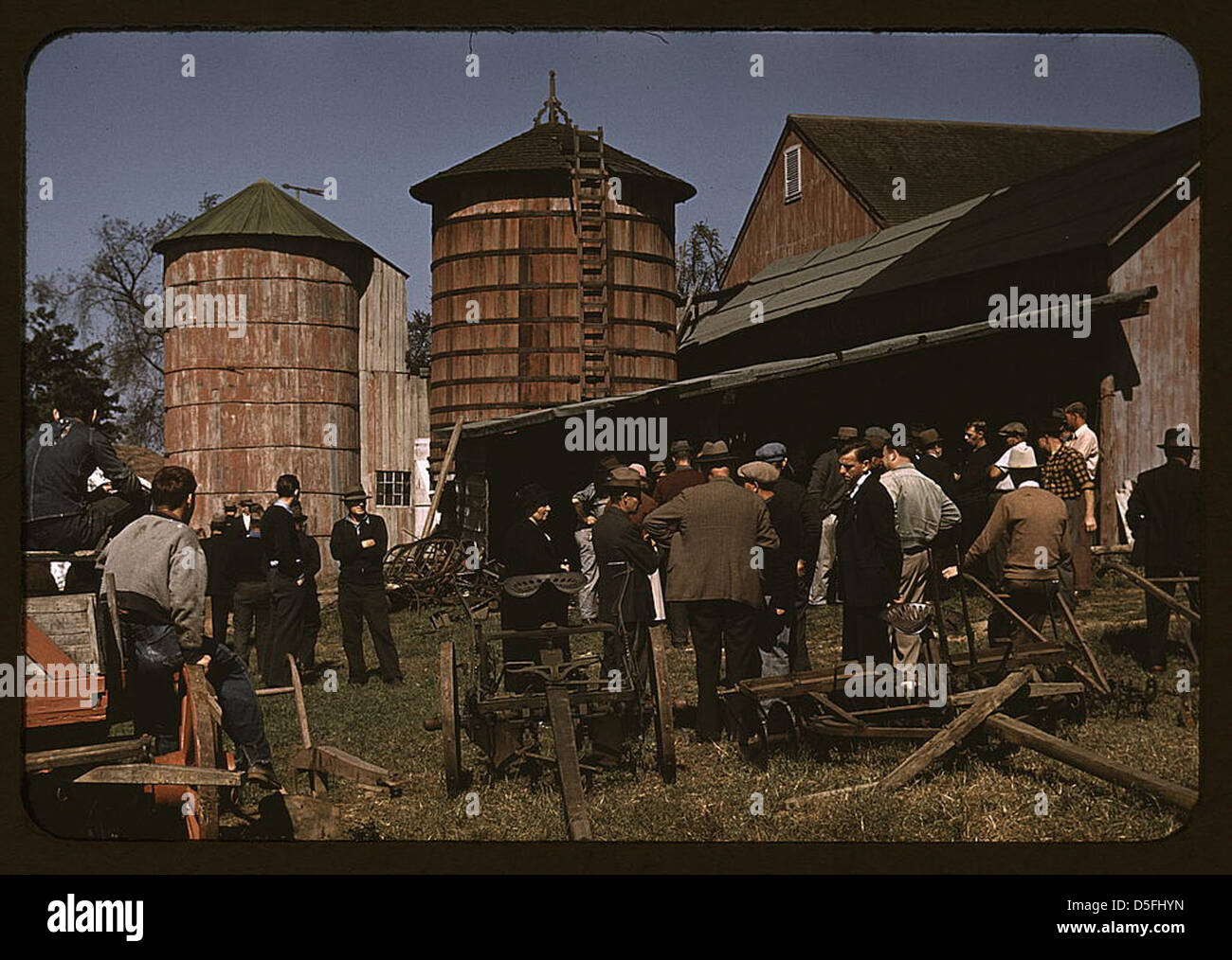 This 1914 photograph depicts a farm auction in Derby, Connecticut. It ...