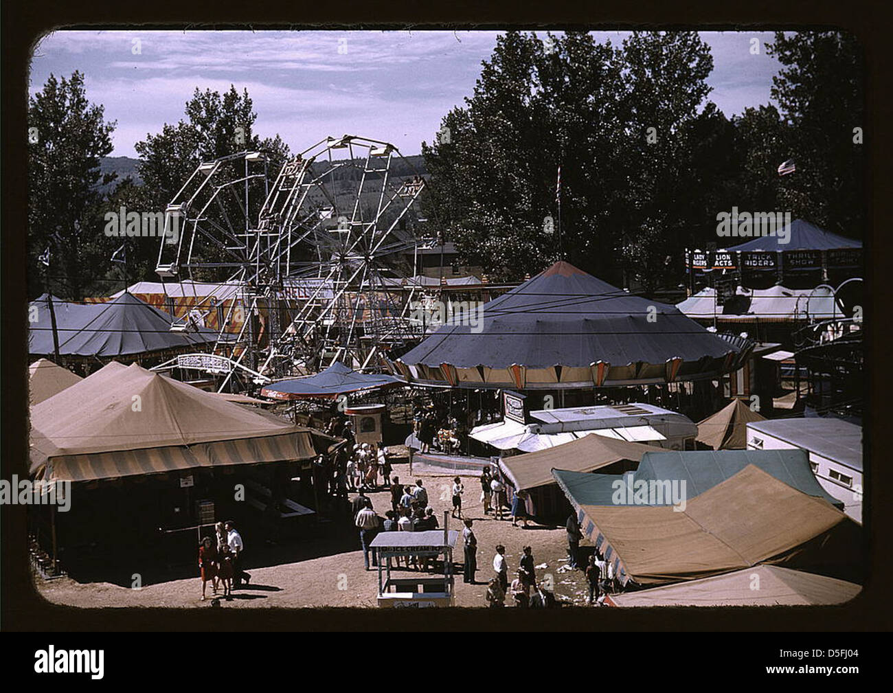 A photograph of carnival side shows at the Vermont State Fair in ...