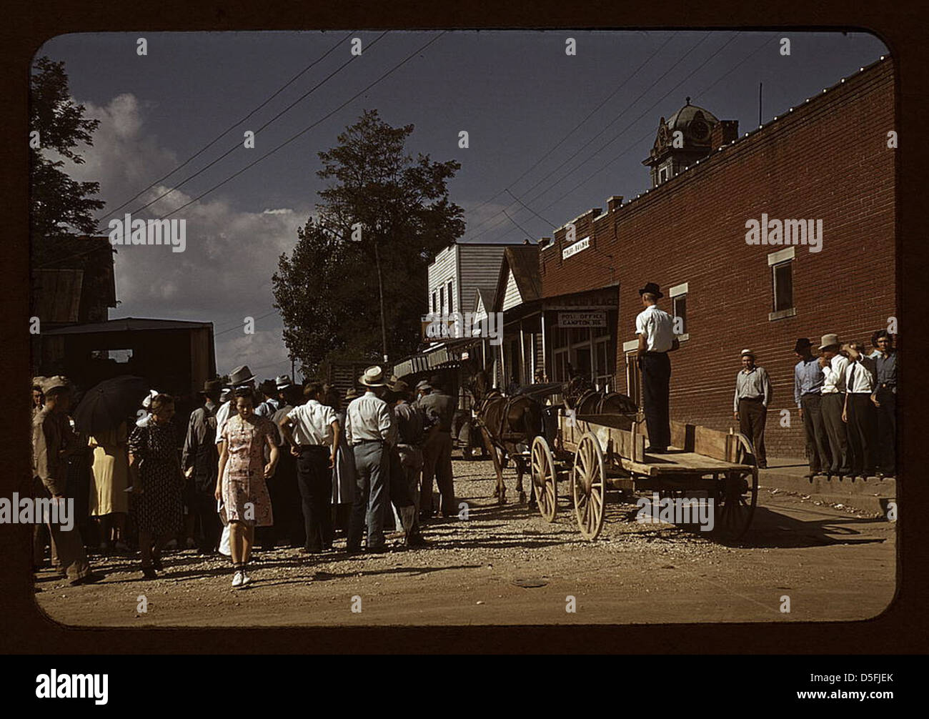 A scene from Campton, Kentucky in 1940 showing farmers and townspeople ...