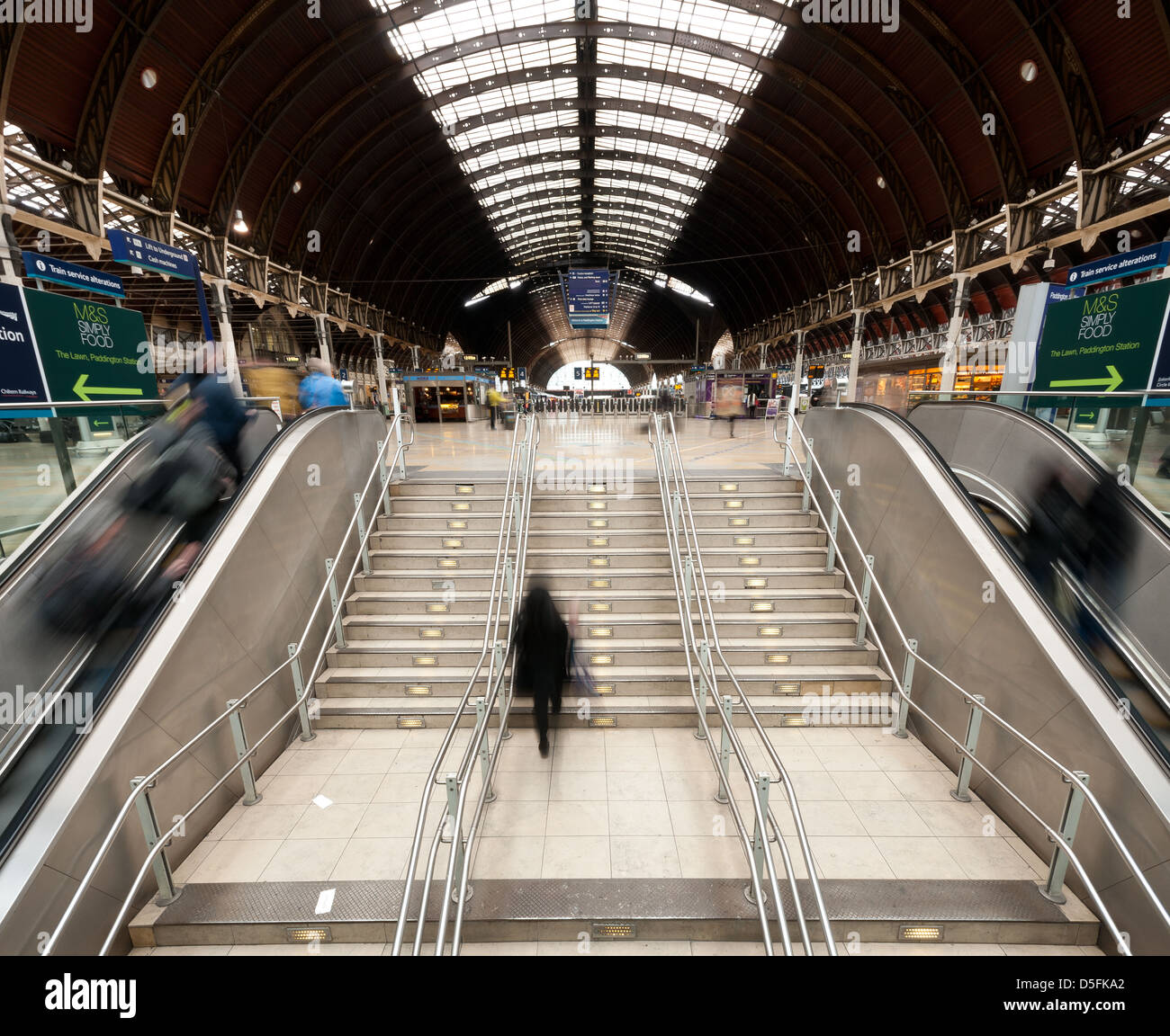 Commuters at Paddington street station during rush hour make their way ...