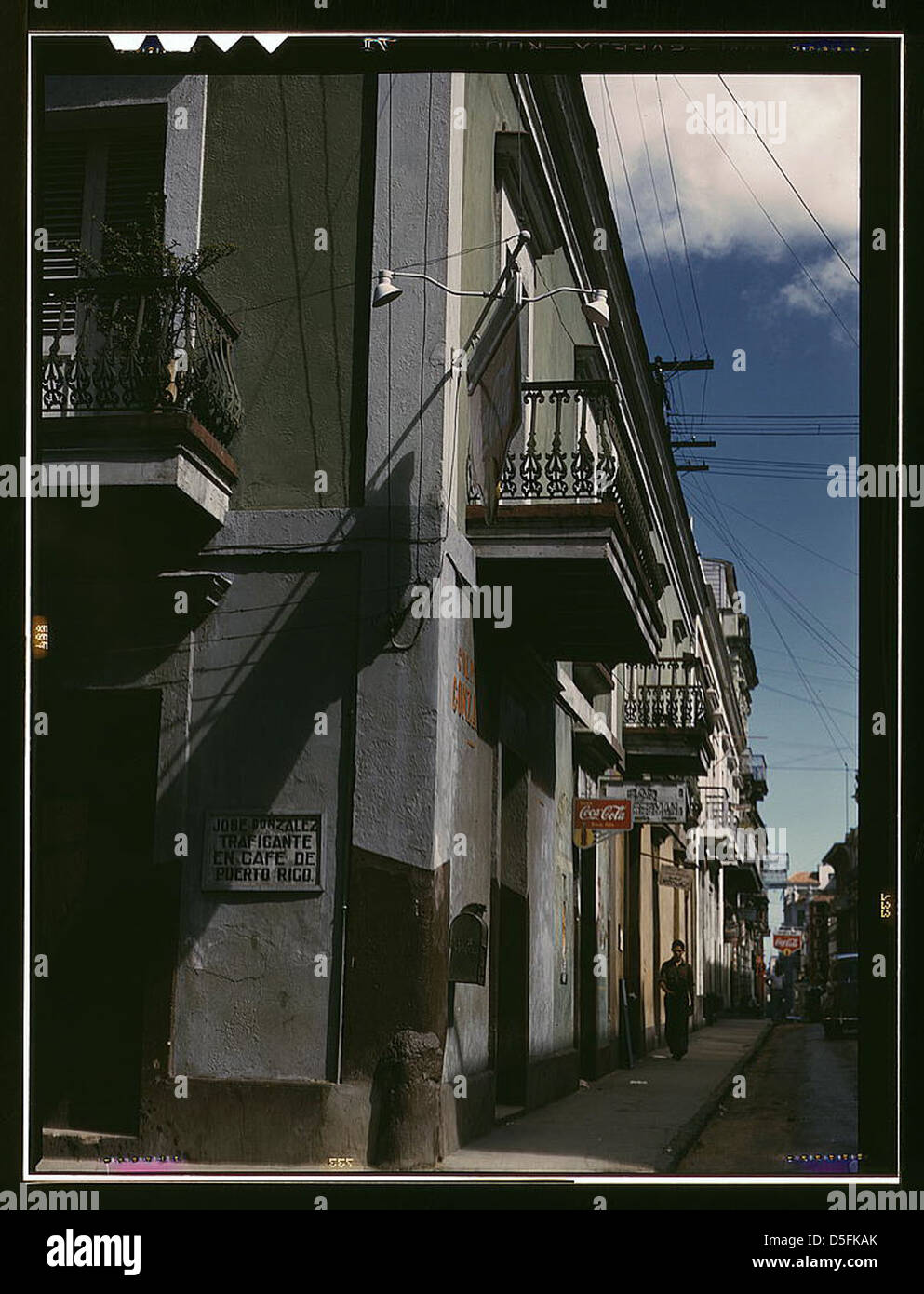 This photograph depicts a street scene in Old San Juan, Puerto Rico ...