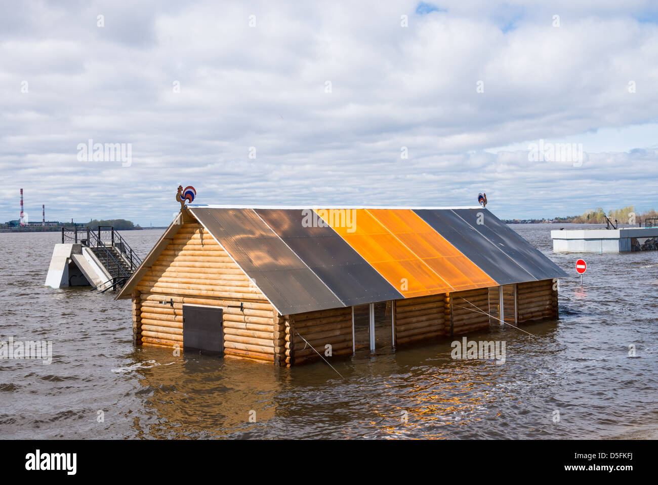 Building under water of flooded river in early spring Stock Photo - Alamy
