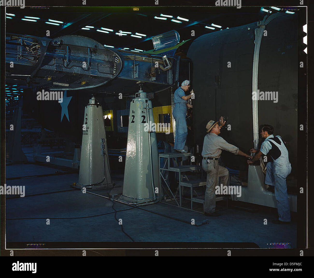 This image from October 1942 shows workers assembling a Liberator ...