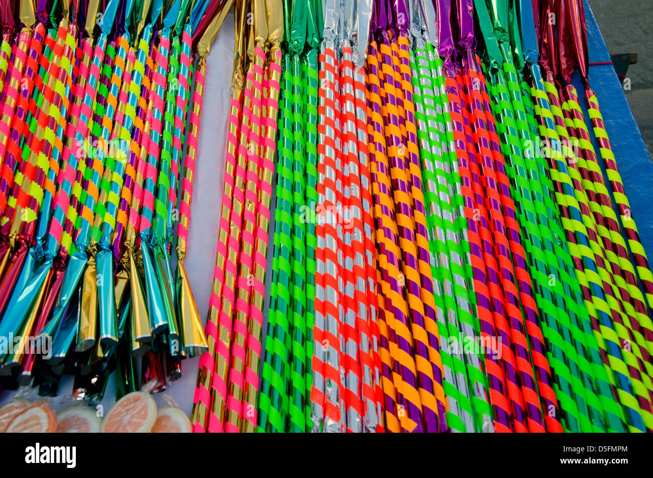 big and long colorful candies in agriculture market Stock Photo - Alamy