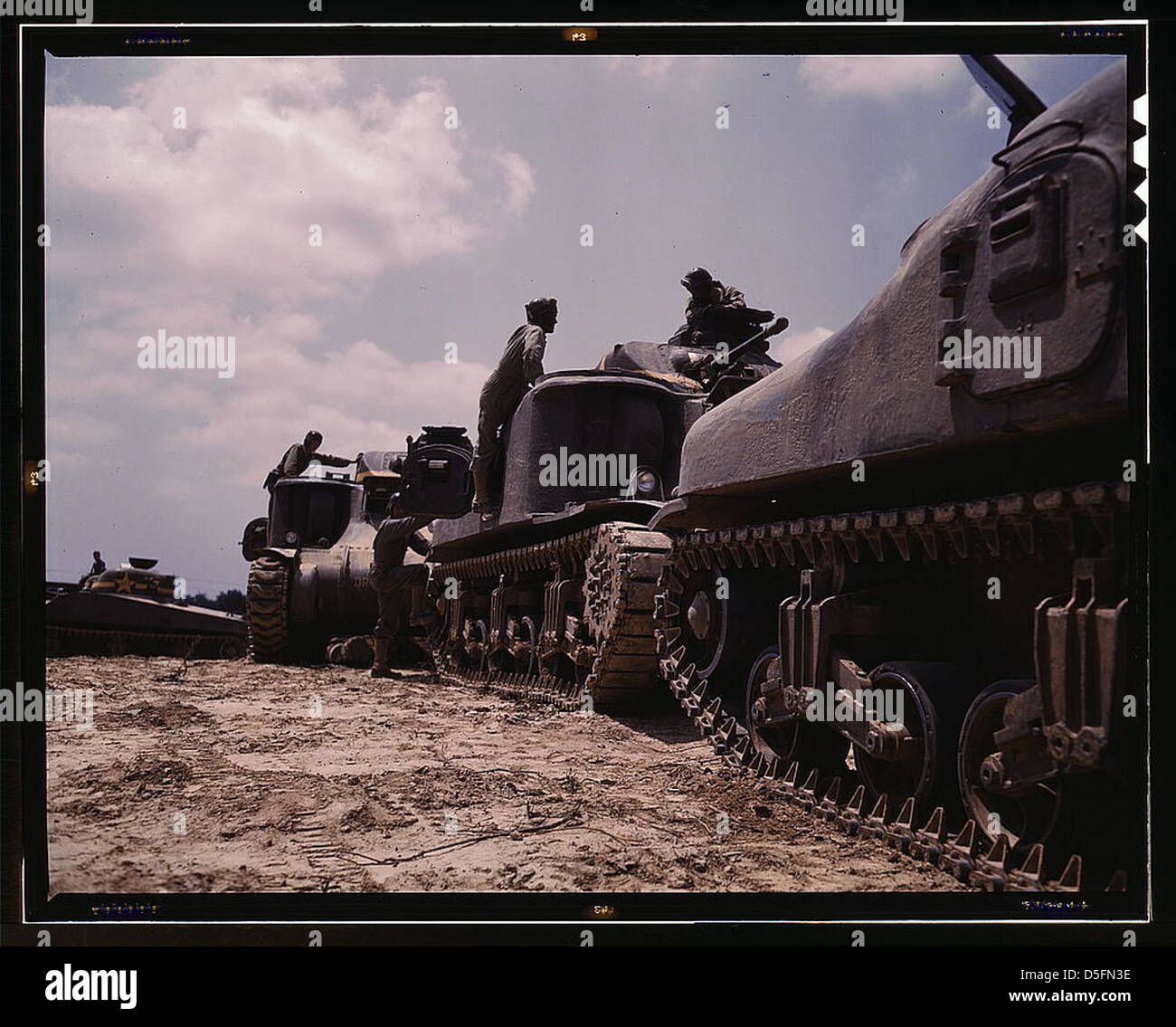 This 1942 photograph shows M-3 and M-4 tanks at bivouac in Fort Knox ...