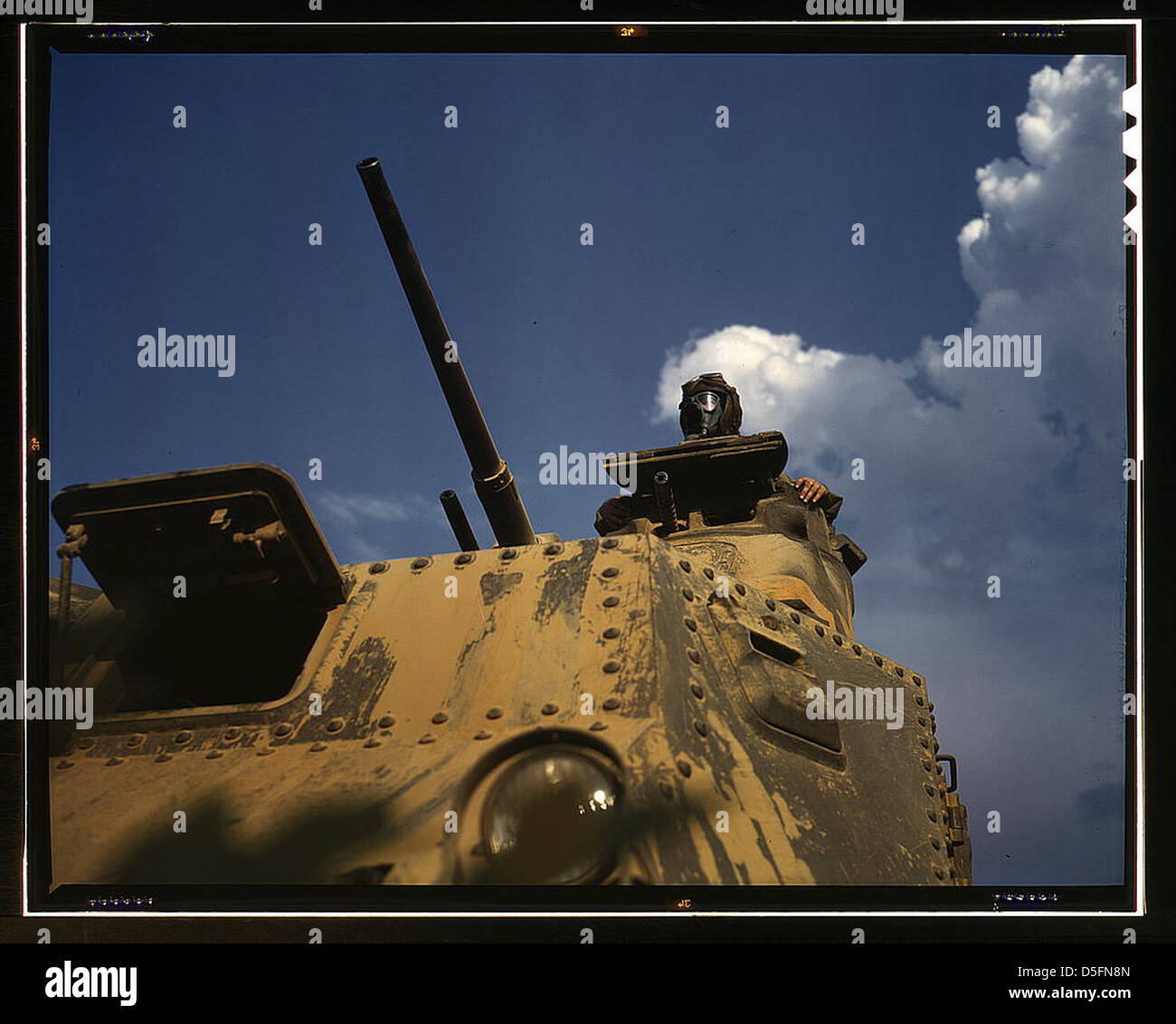 A tank commander at Fort Knox, Kentucky, in June 1942, wearing a gas ...