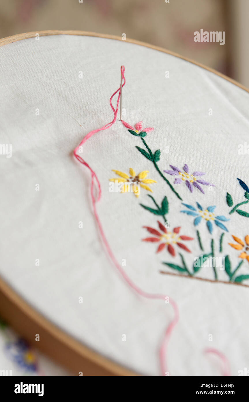 Hand embroidery using an embroidery ring Stock Photo - Alamy