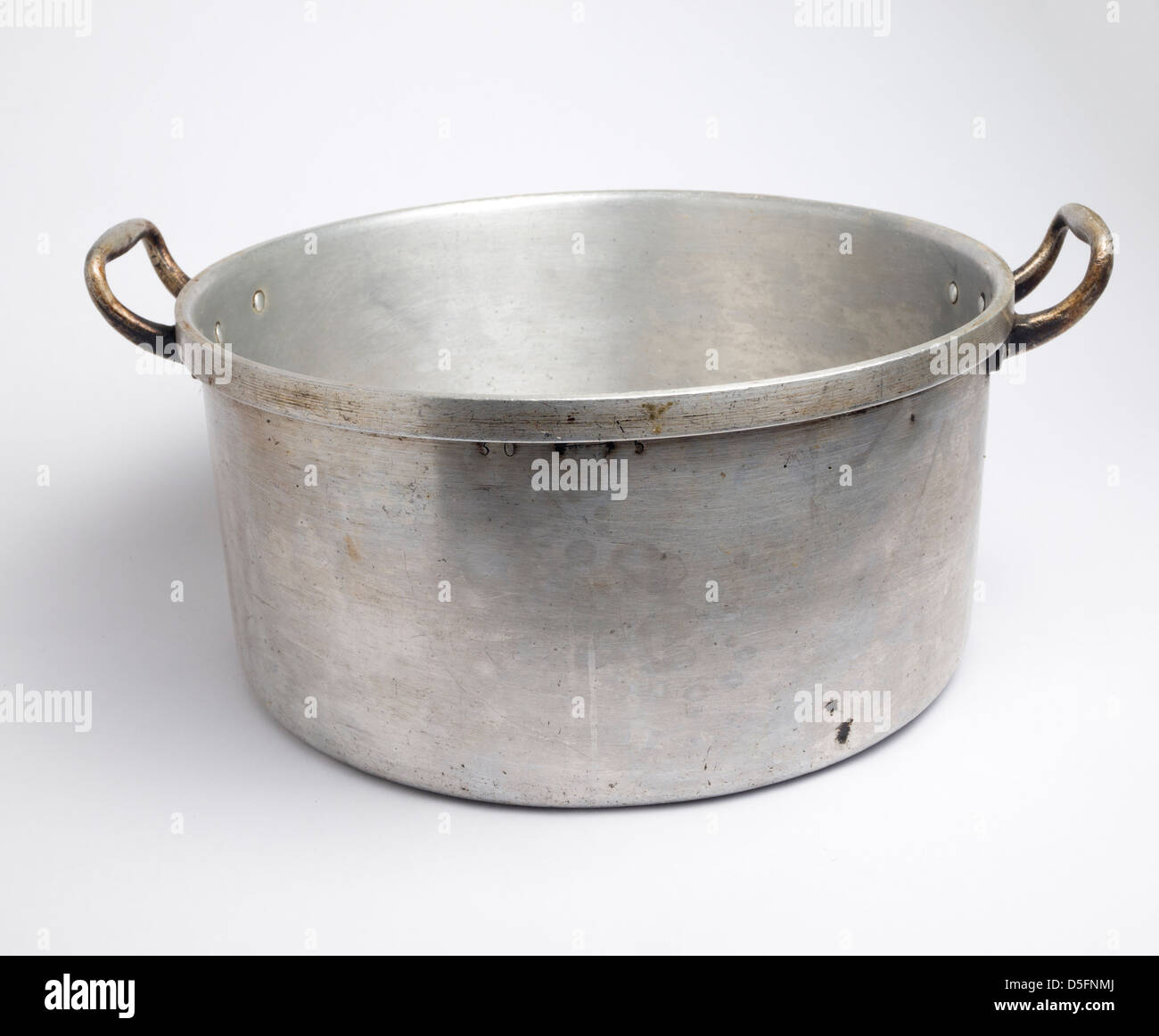 Large metal saucepan isolated on white background Stock Photo - Alamy