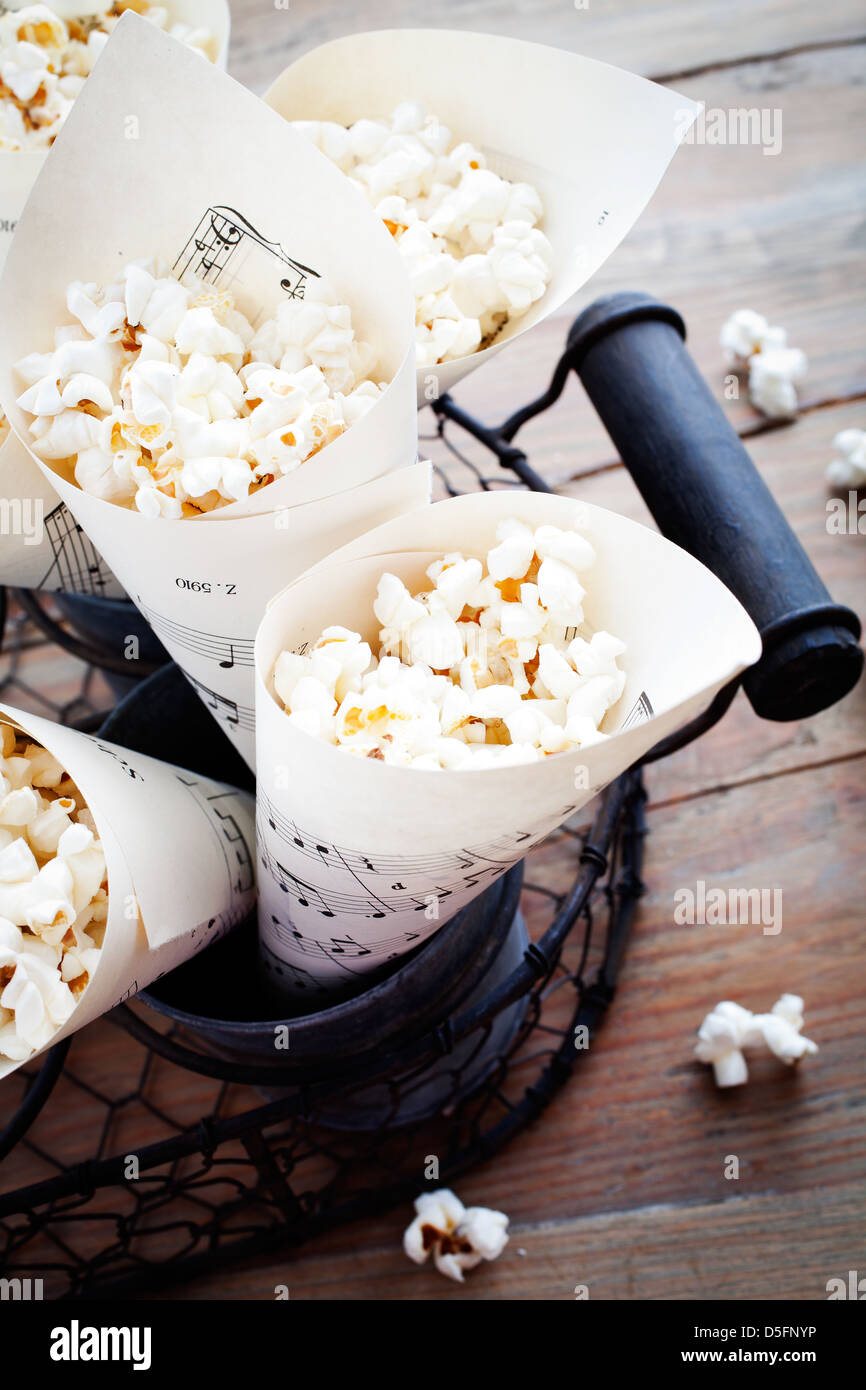 Pop corn in paper cones made from music sheets Stock Photo - Alamy