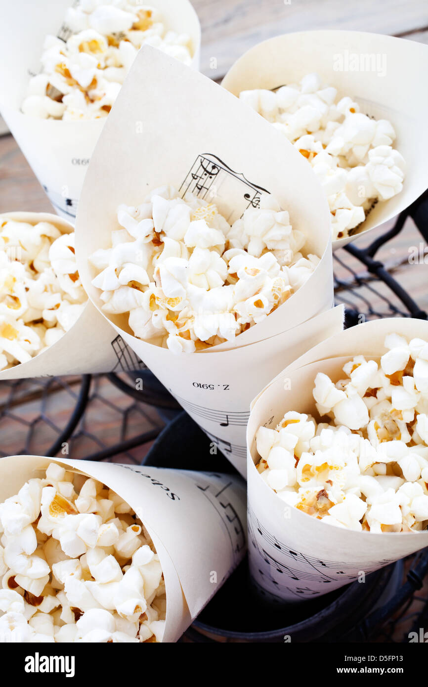 Pop corn in paper cones made from music sheets Stock Photo - Alamy