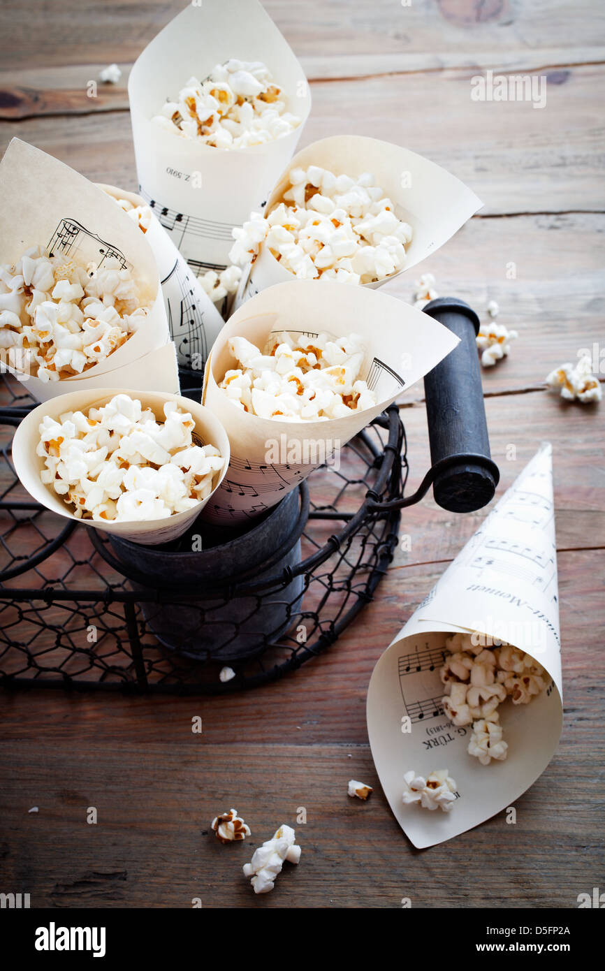 Pop corn in paper cones made from music sheets Stock Photo - Alamy