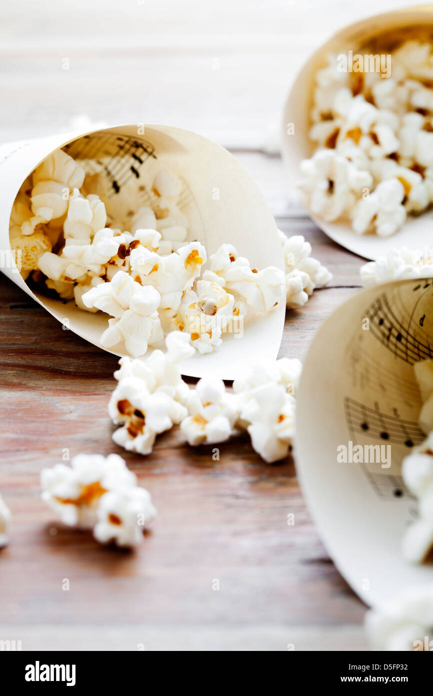 Pop corn in paper cones made from music sheets Stock Photo - Alamy